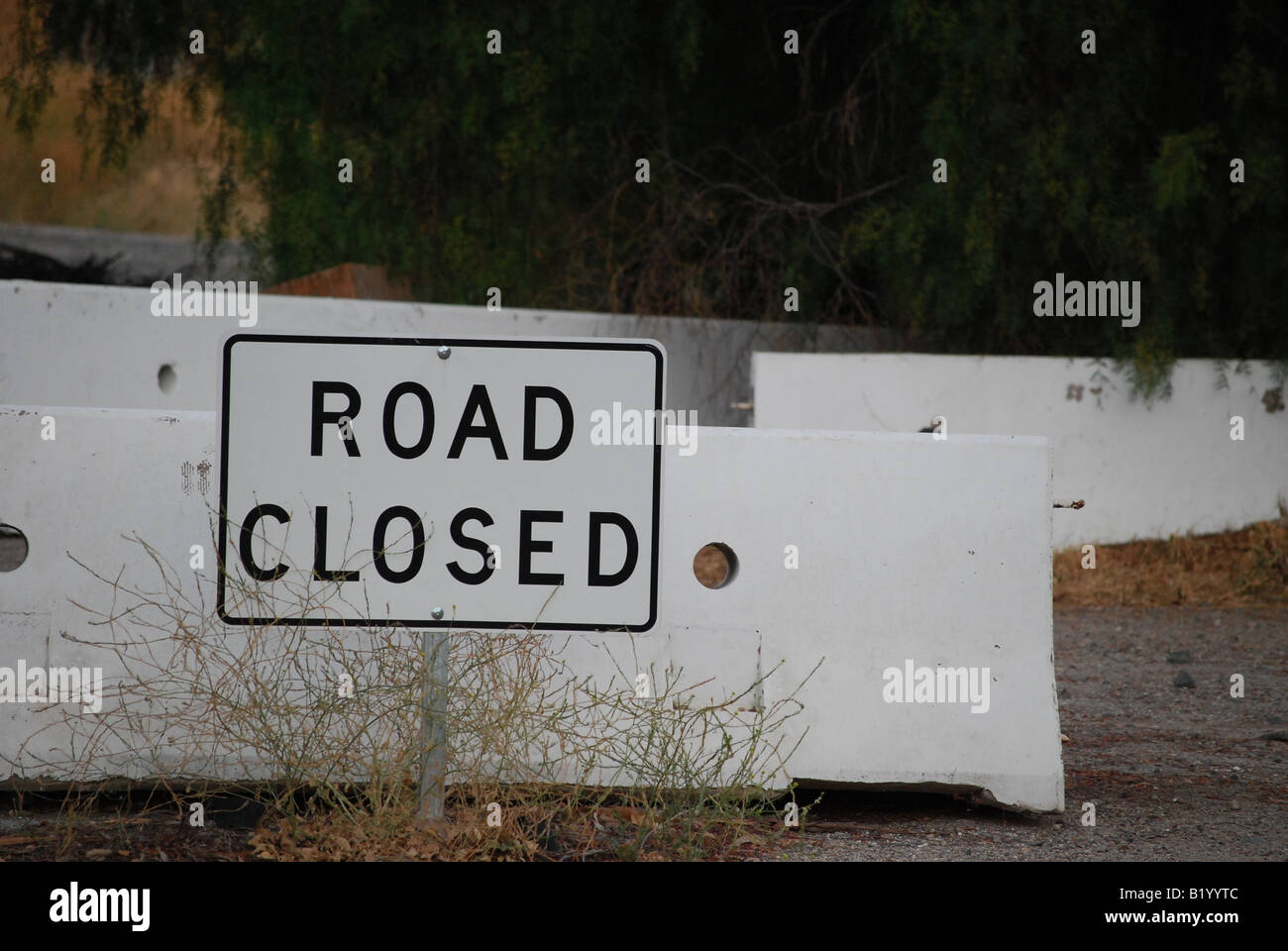 Road Closed Sign with Concrete Barriers Stock Photo - Alamy
