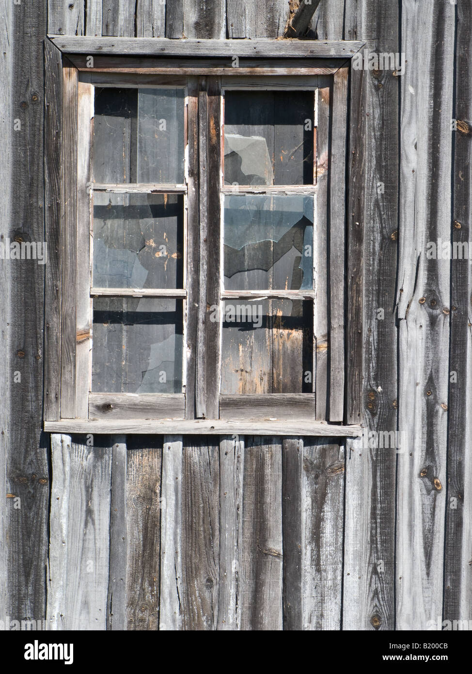 old wooden barn window with glasses cracked Stock Photo - Alamy