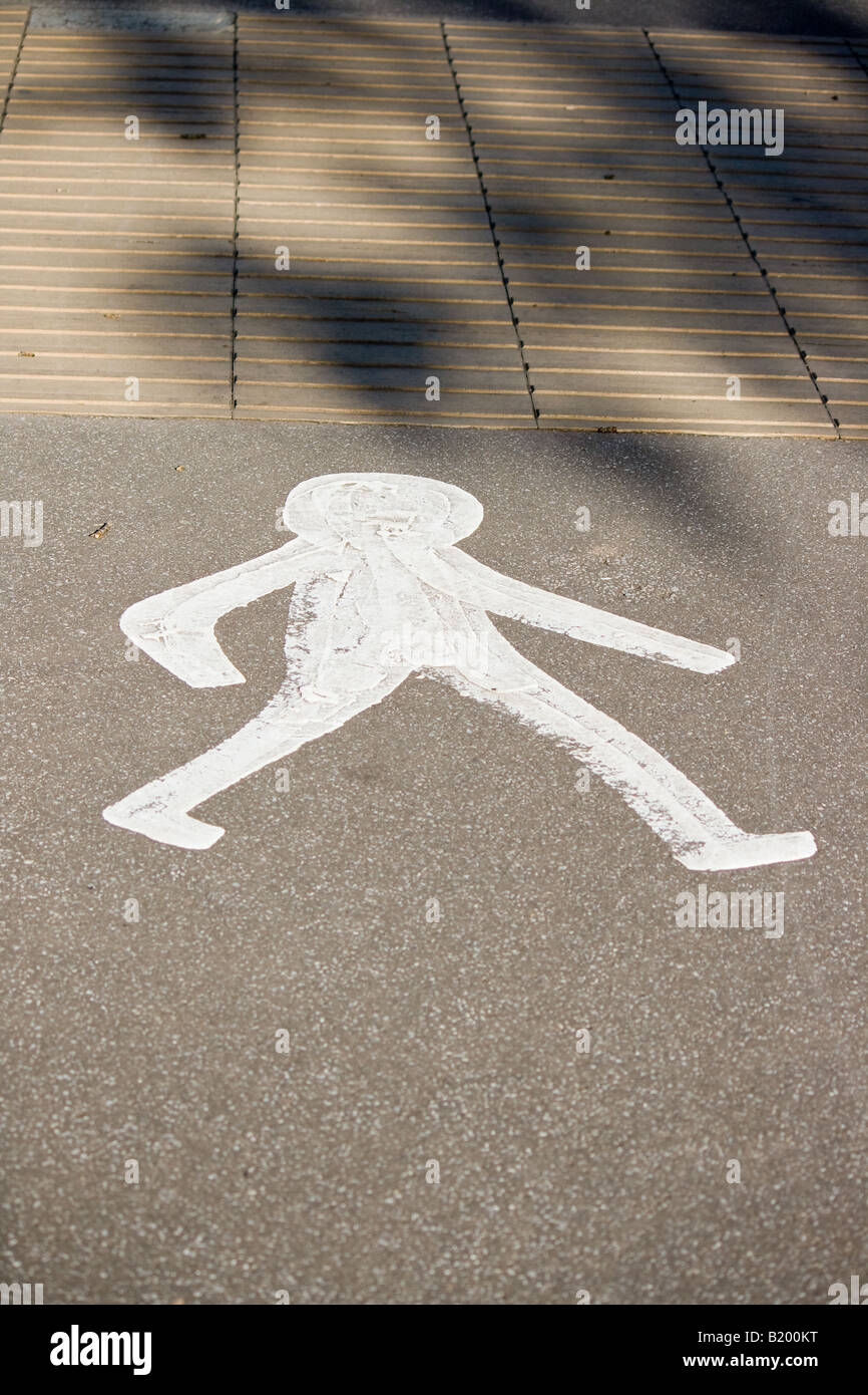 White painted walkway signage on a path Stock Photo - Alamy