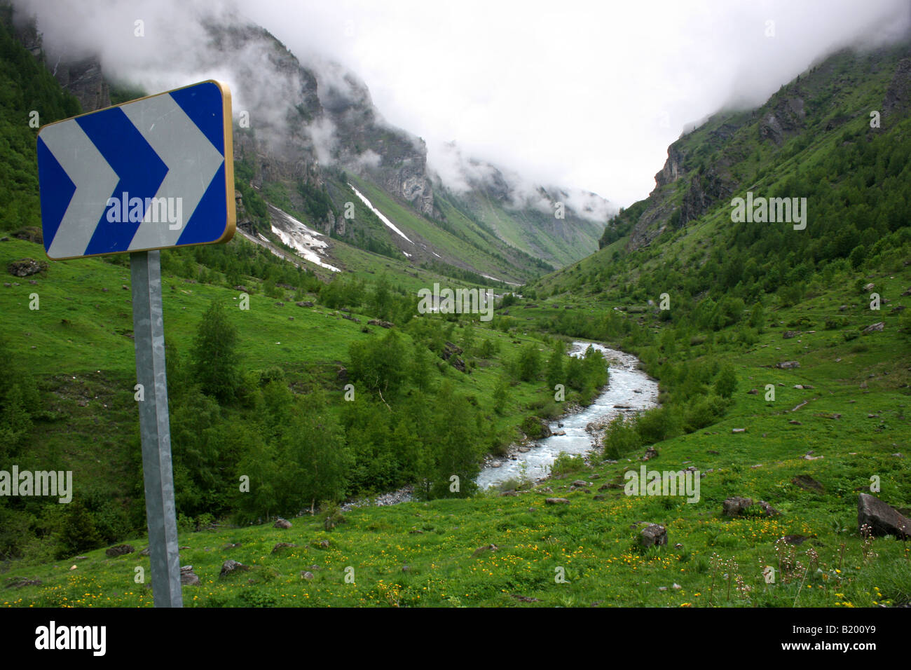 sharp bend warning sign in the Alps, Cret Bettex, Savoie department ...