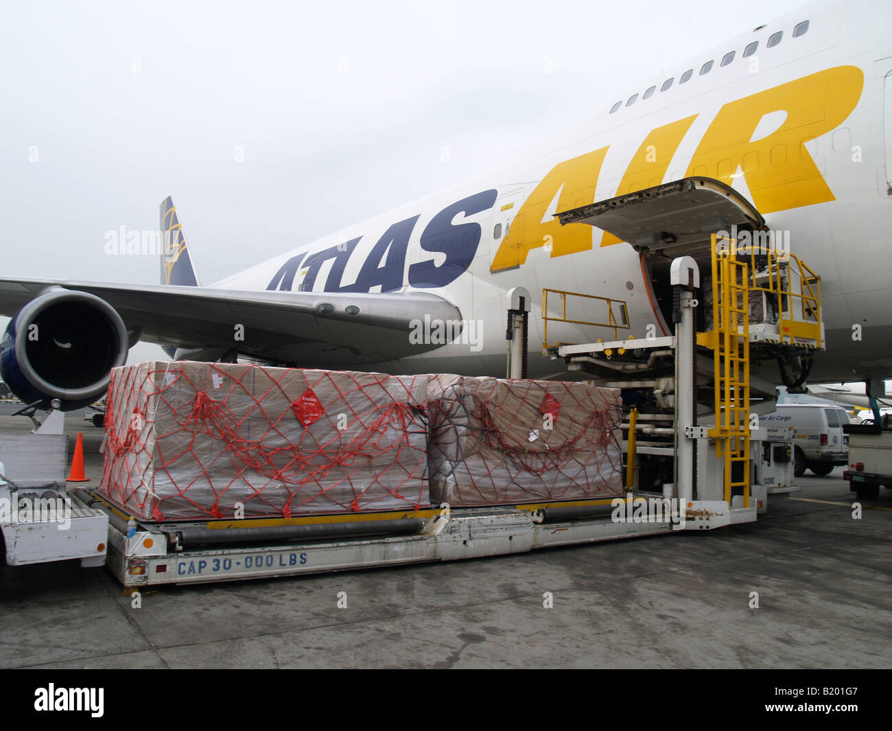 Cargo plane being loaded with frieght at JFK, John F. Kennedy ...