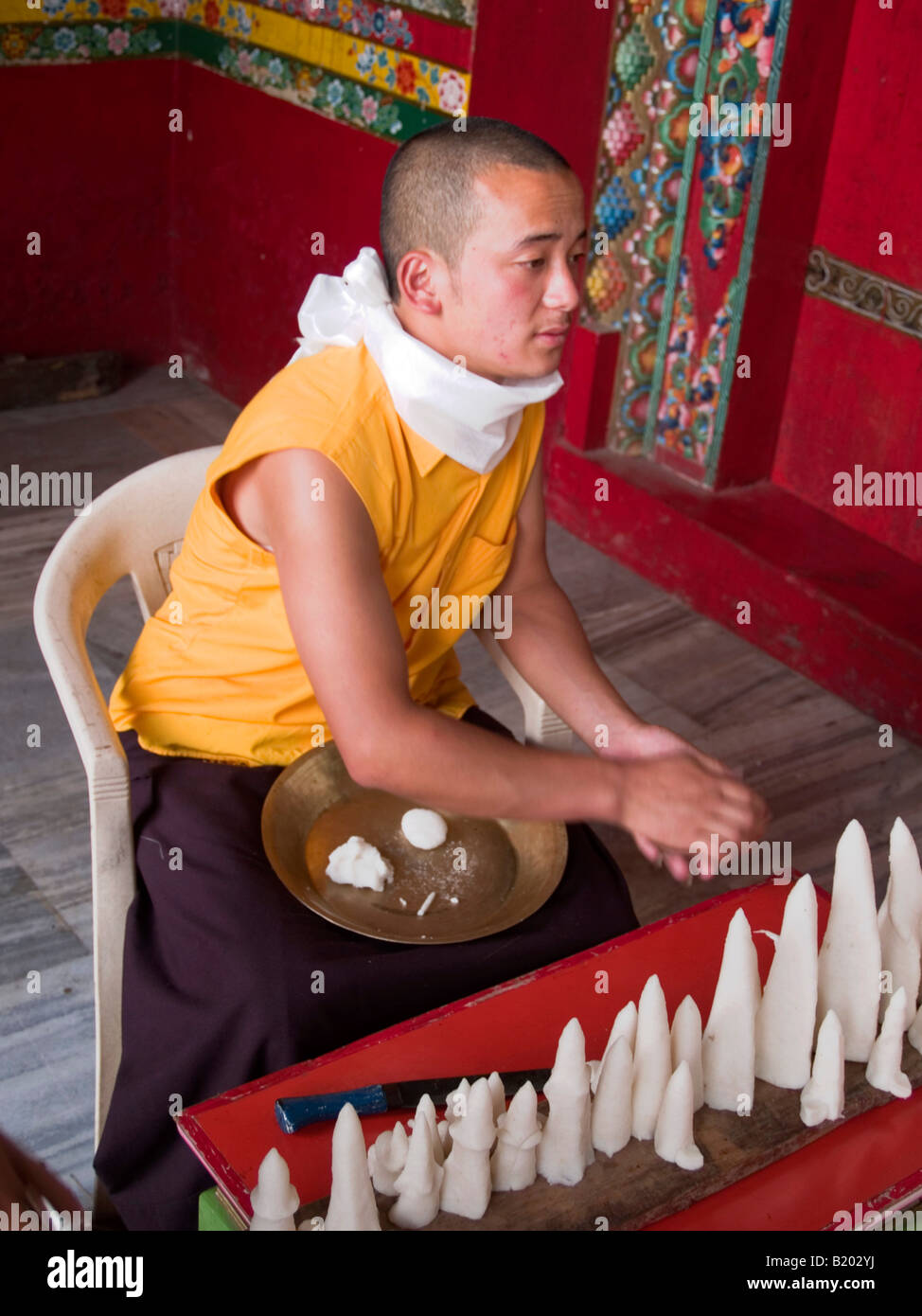 monk in Sikkim India making butter candles at his monastery Stock Photo ...