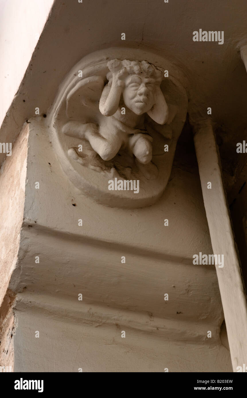 Cherub sculpture in a doorway in Paris Stock Photo - Alamy