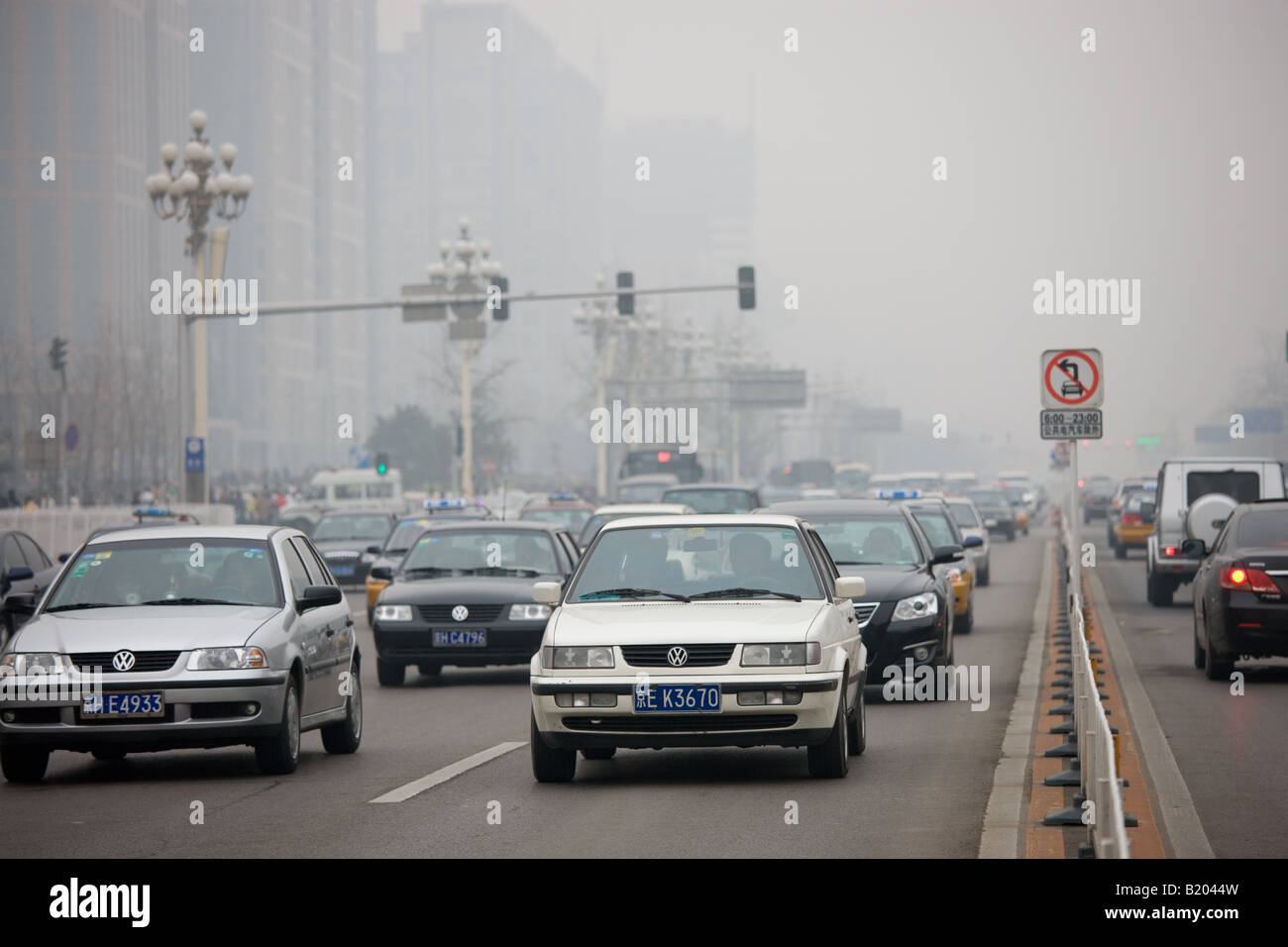 Heavy traffic congestion and smog air pollution on Beijing main street ...