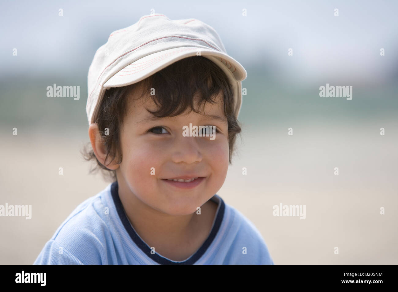Portrait of a little boy with a cap Stock Photo - Alamy