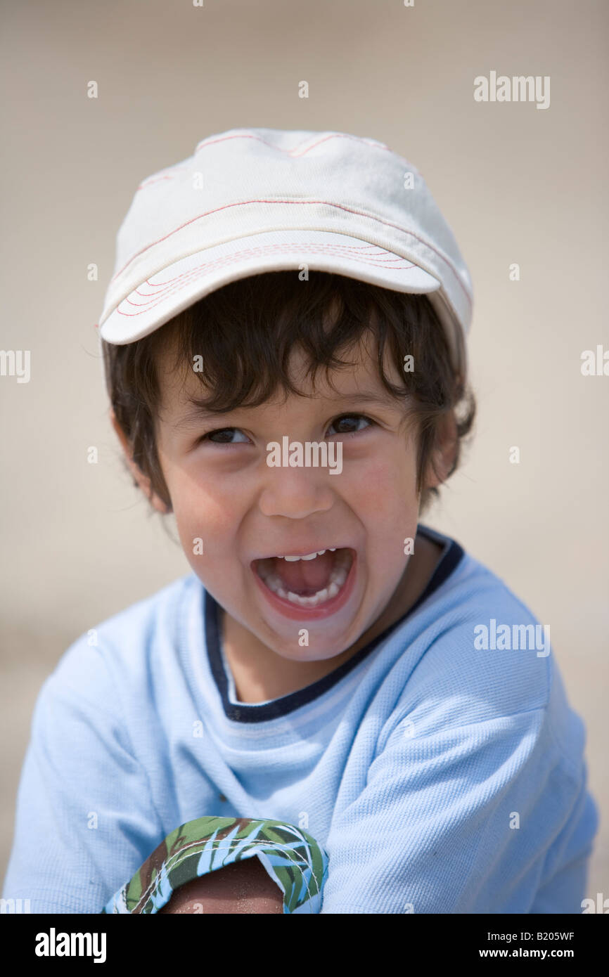 Portrait of a little boy with a cap Stock Photo - Alamy