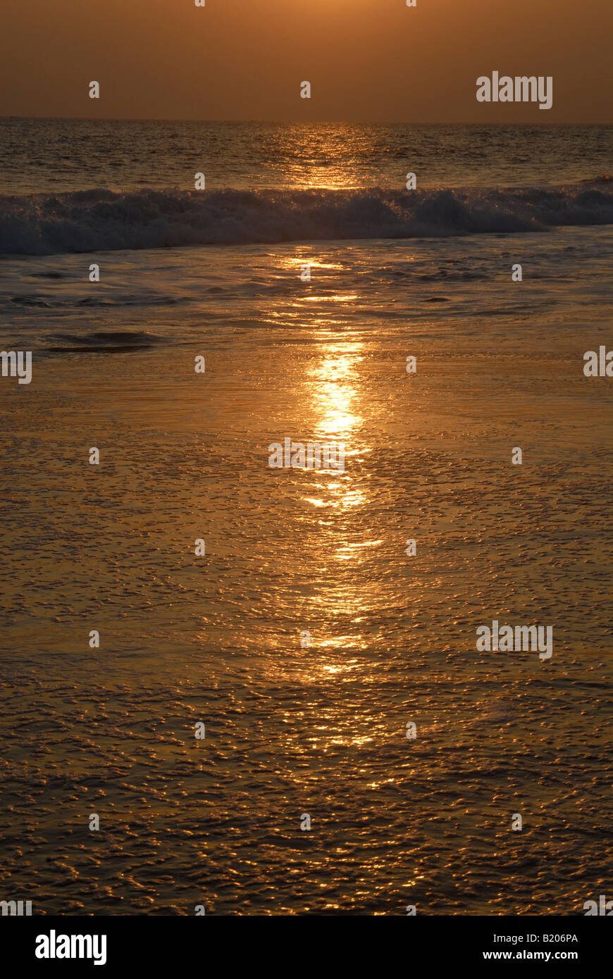 sunset at a kerala beach Stock Photo - Alamy