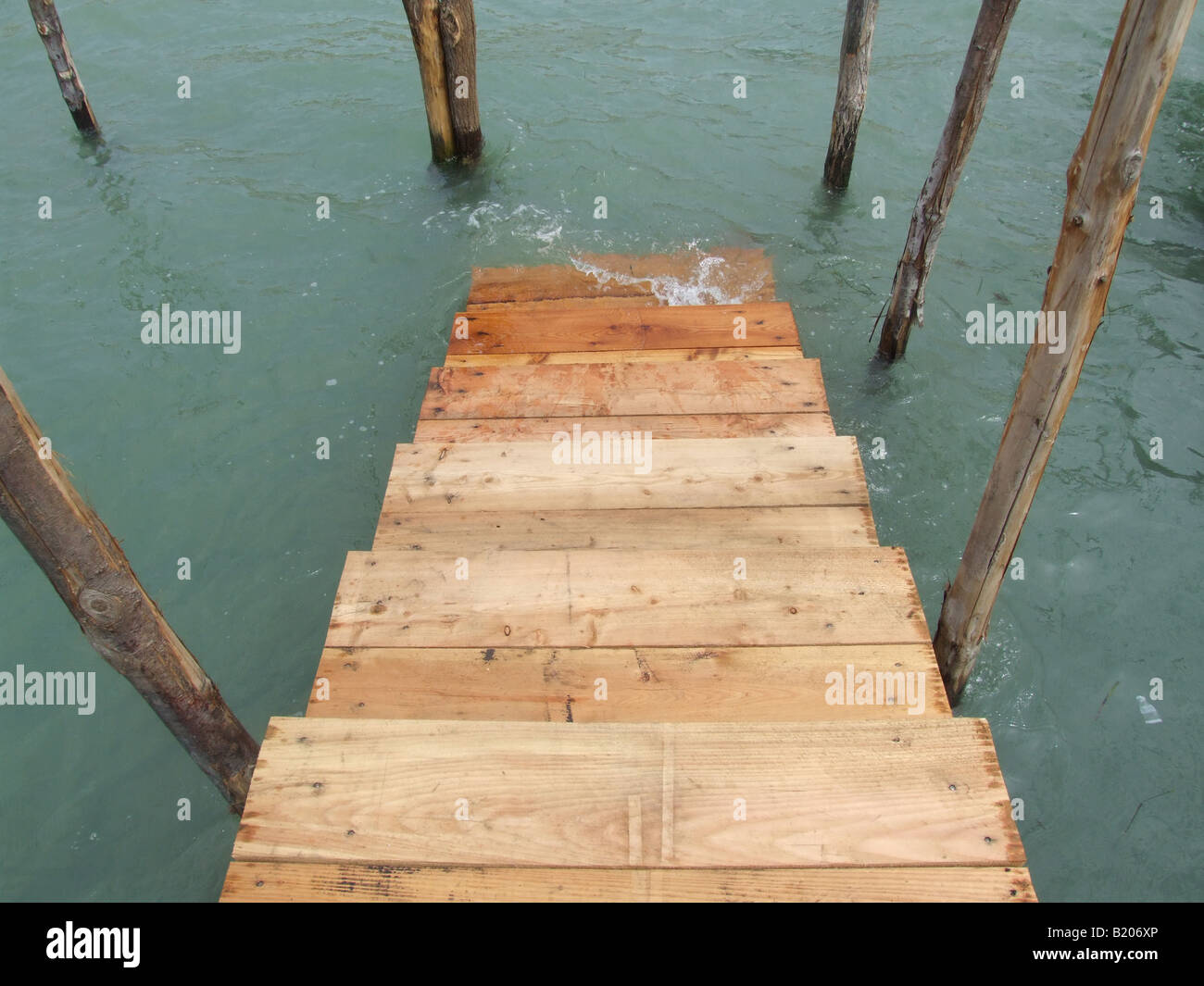 small wooden jetty steps by sea water Stock Photo - Alamy