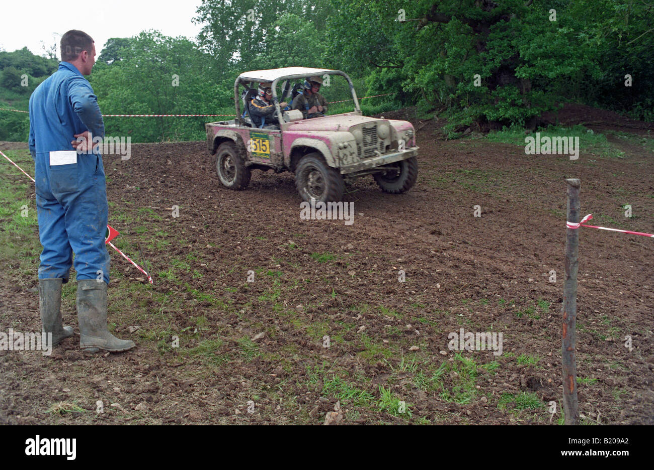 Spectator watching a Land Rover Series 1 based off-road racer competing ...