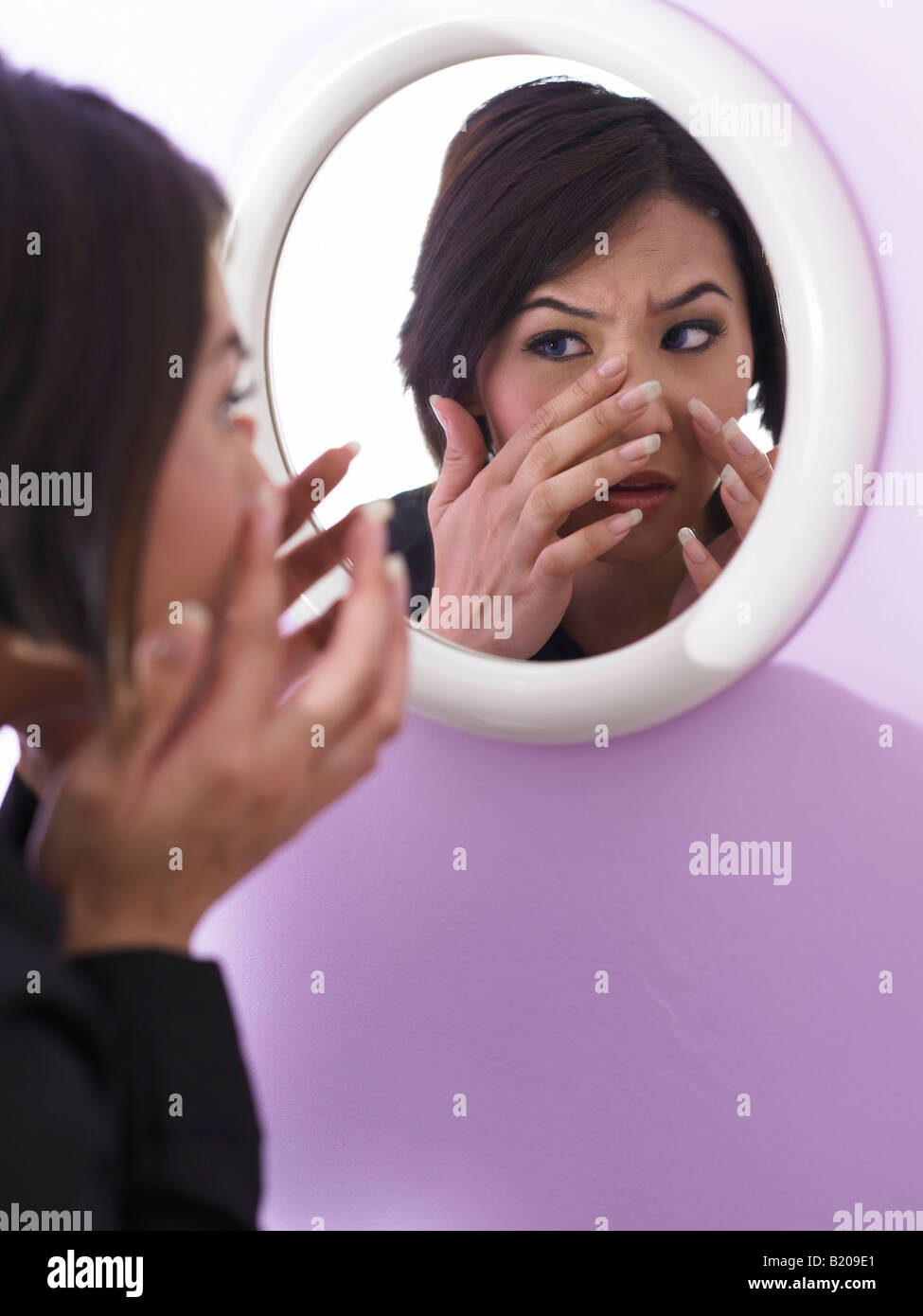 ropped image of pretty woman pressing her nose Stock Photo - Alamy