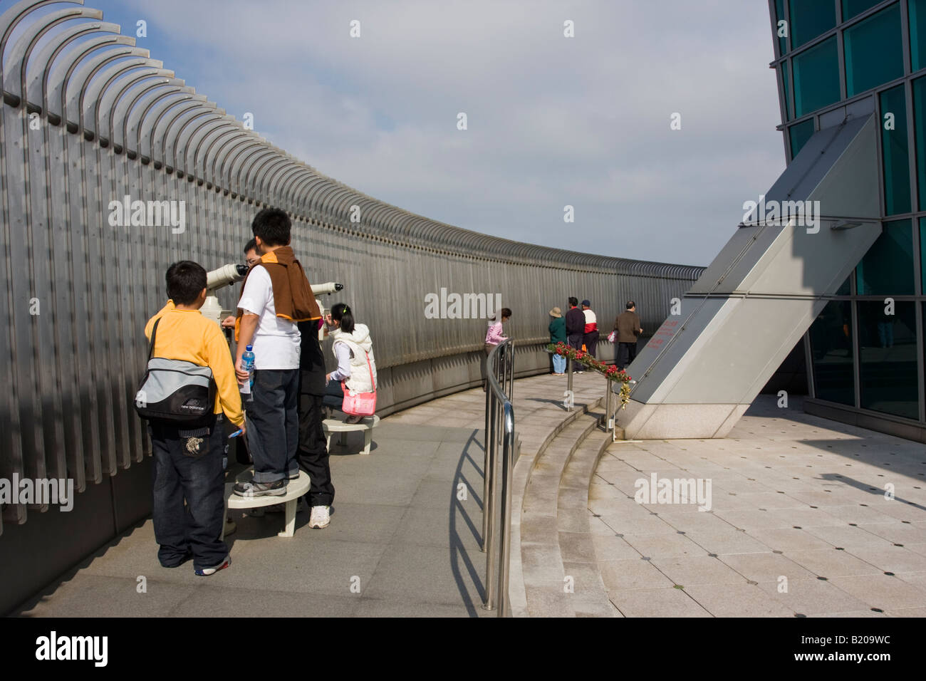 People behind barrier High Resolution Stock Photography and Images - Alamy