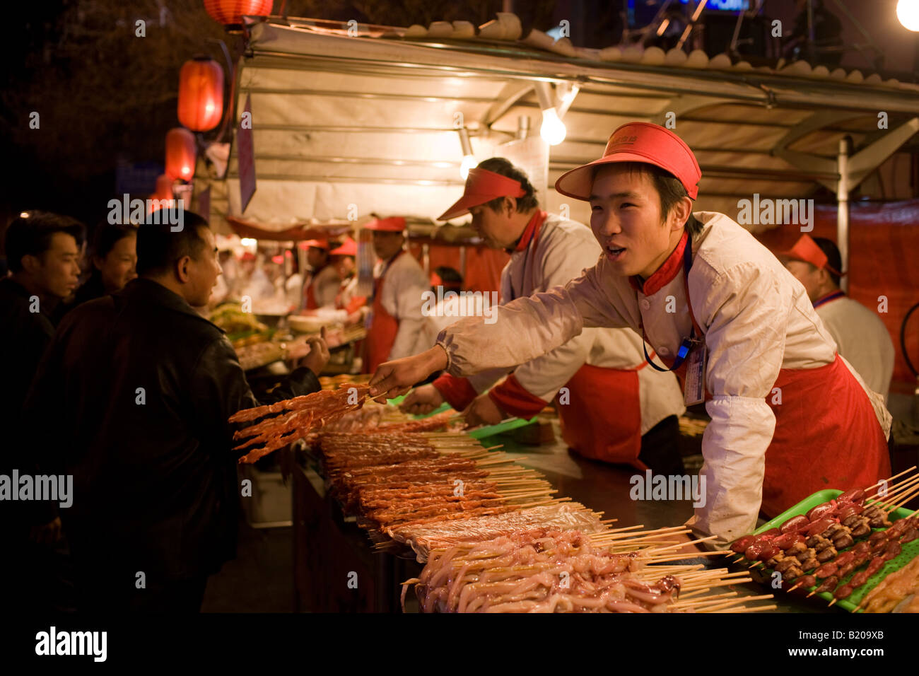 Stall selling meat kebabs in the Night Market Wangfujing Street Beijing ...