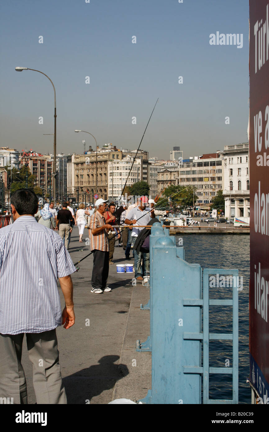 Men fishing on the Galata bridge in Istanbul in Turkey Stock Photo - Alamy