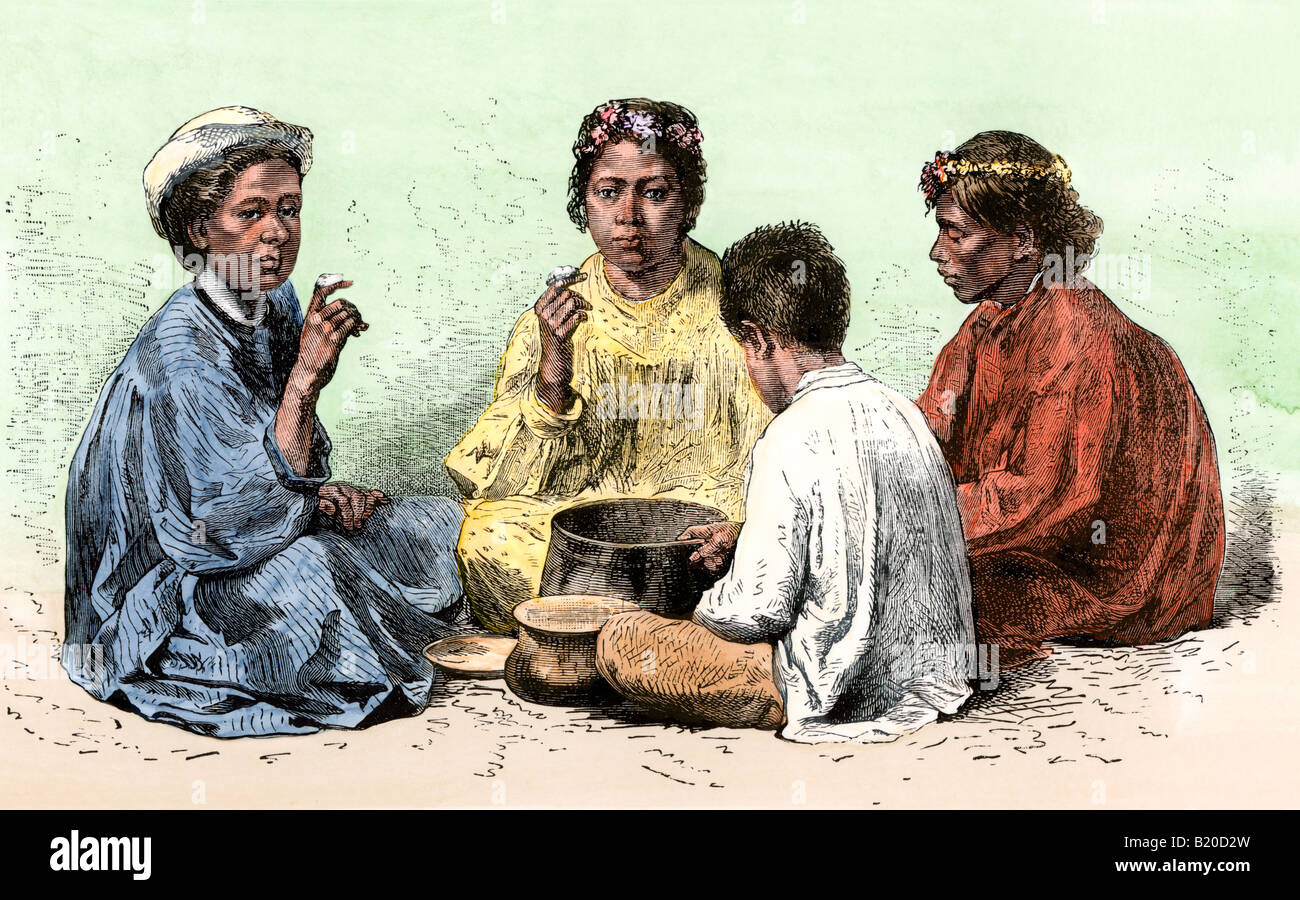 Hawaiian family eating poi a dish made from taro root mid 1800s. Hand ...