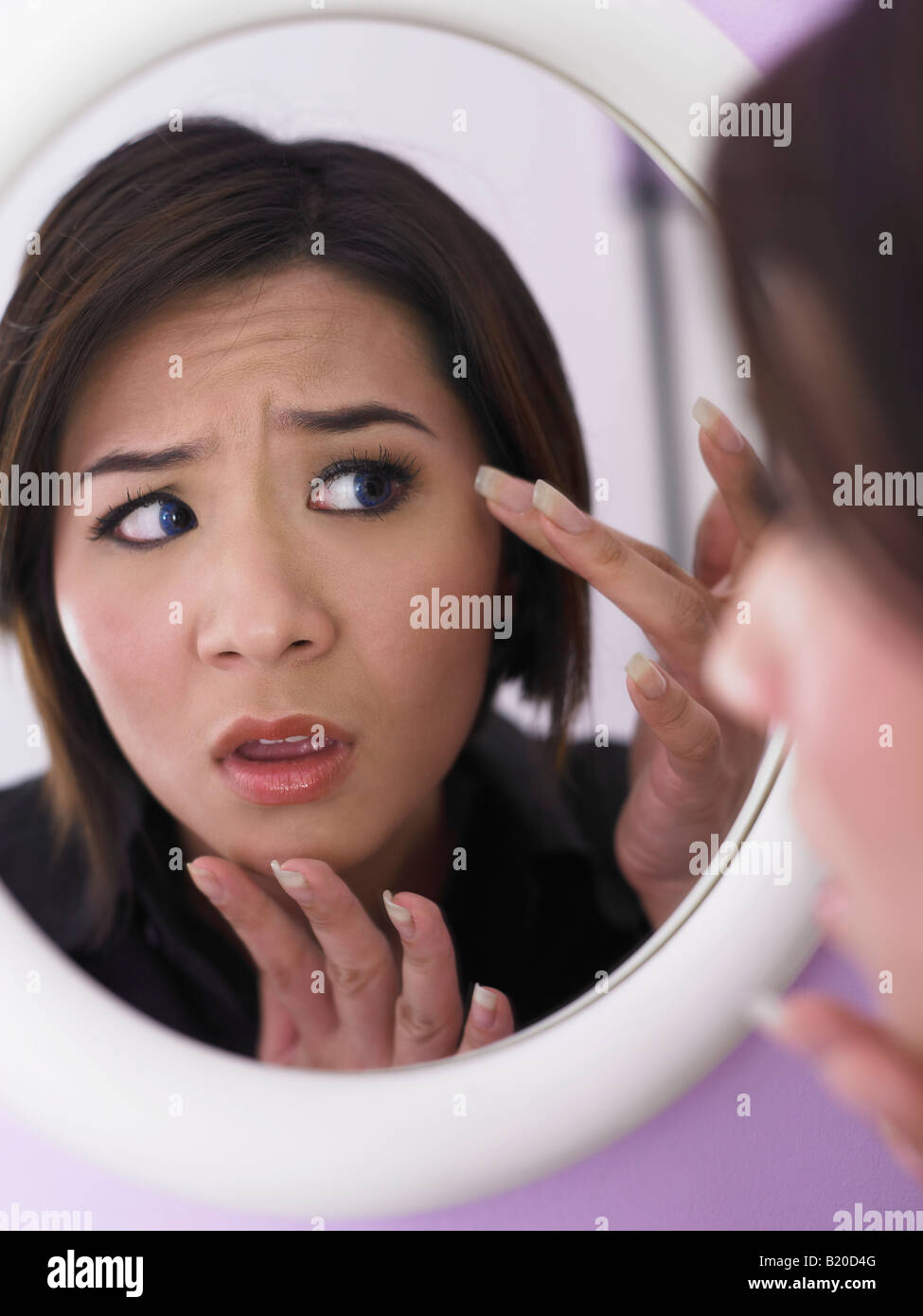 Reflection of young woman bewitching Stock Photo - Alamy