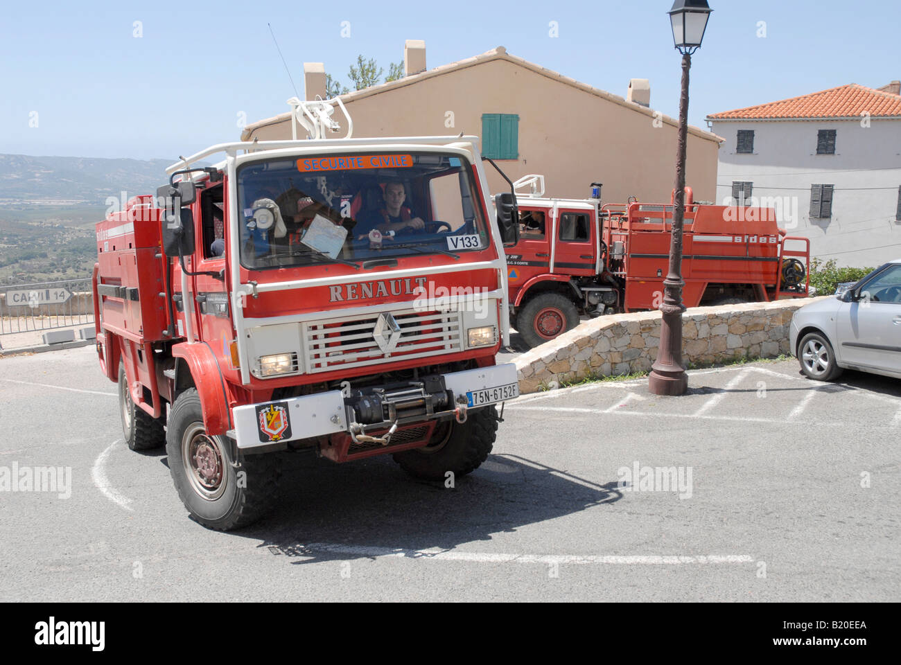 Fire emergency rescue vehicle travelling through the mountain village ...