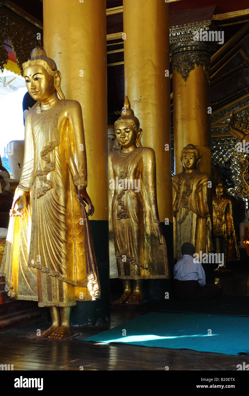 solitude, monk praying inside temple , shwedagon pagoda , rangoon ...