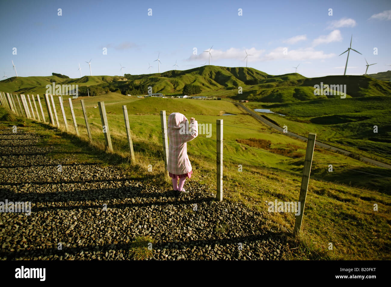 Girl explores a windmill open to visitors at Te Apiti windfarm near ...