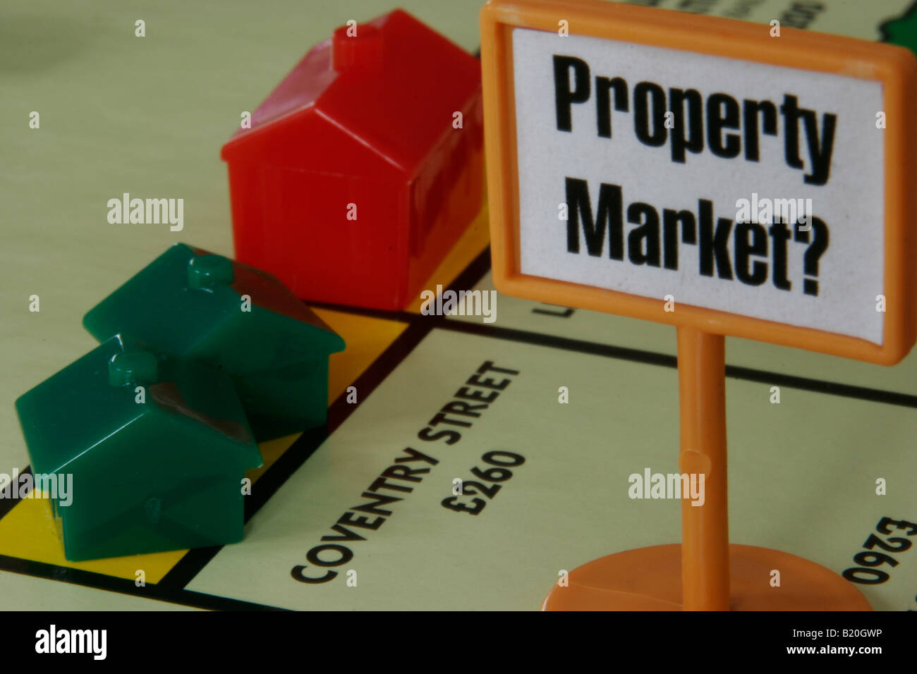 Monopoly houses with 'Propery Market?' sign on the playing board Stock ...