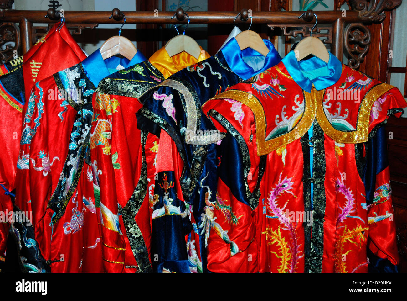 Waiters costumes in a Chinese restaurant Beijing China Stock Photo - Alamy