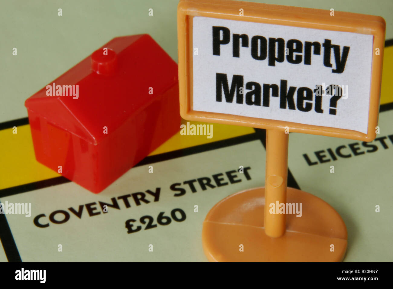 Monopoly house with 'Property Market?' sign on the playing board Stock ...