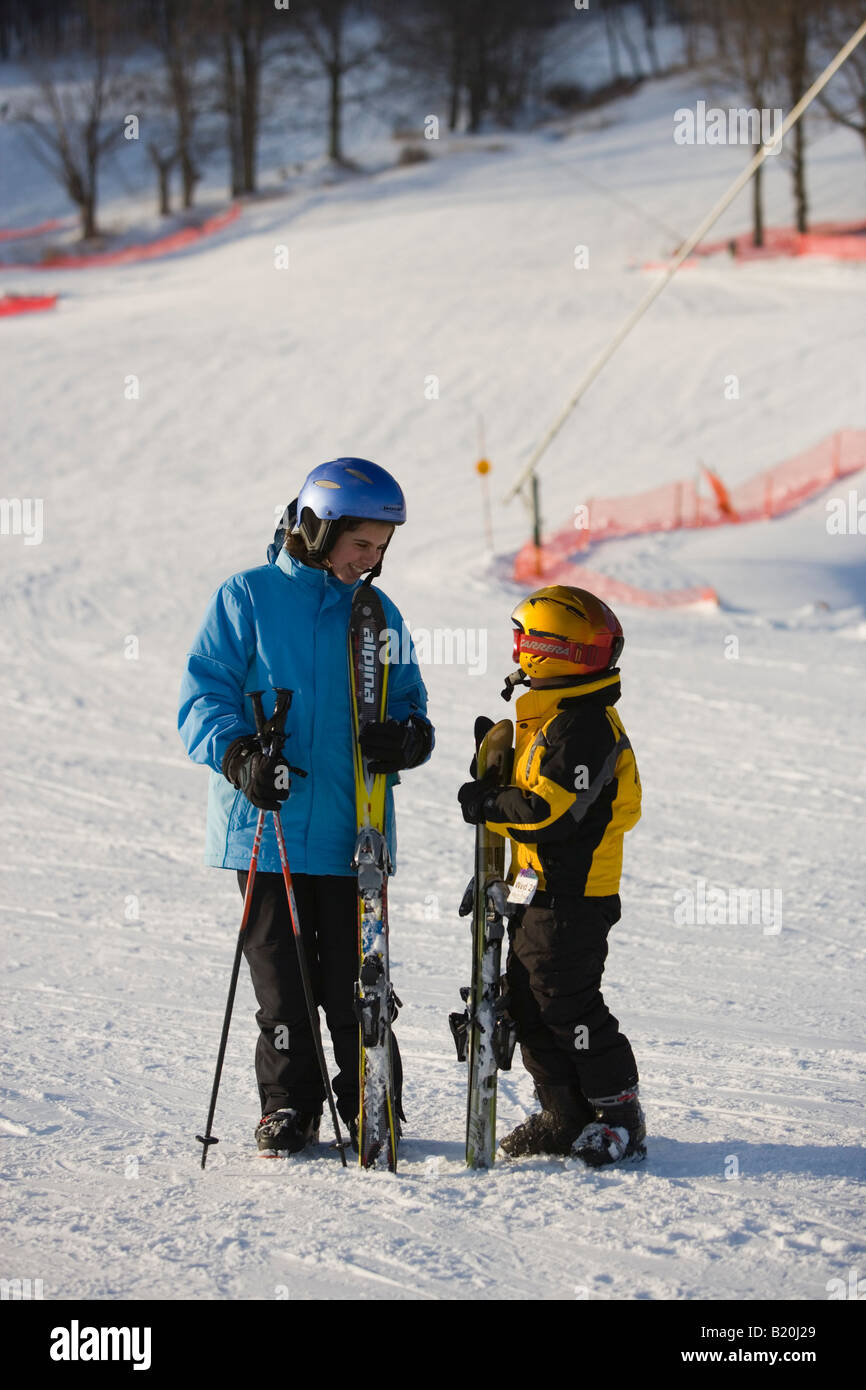 A brother and sister at the bottom of the Quechee Ski Hill in Quechee ...