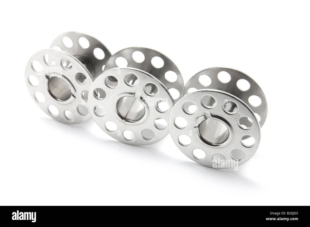 Sewing Machine Bobbins Stock Photo - Alamy