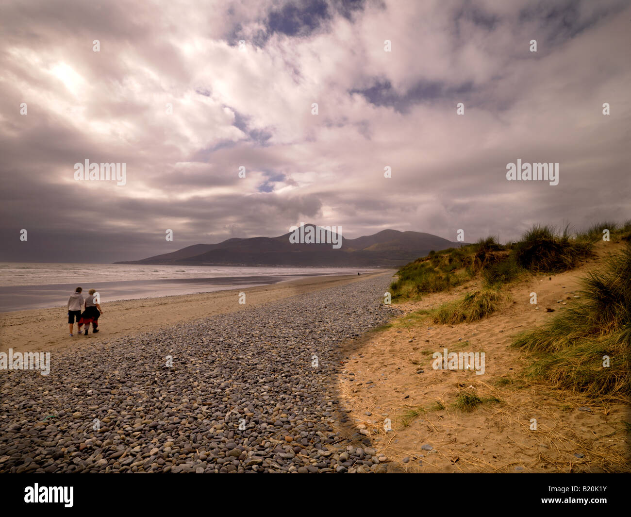 Seascape of Mourne mountains and sandy beach. High resolution image ...