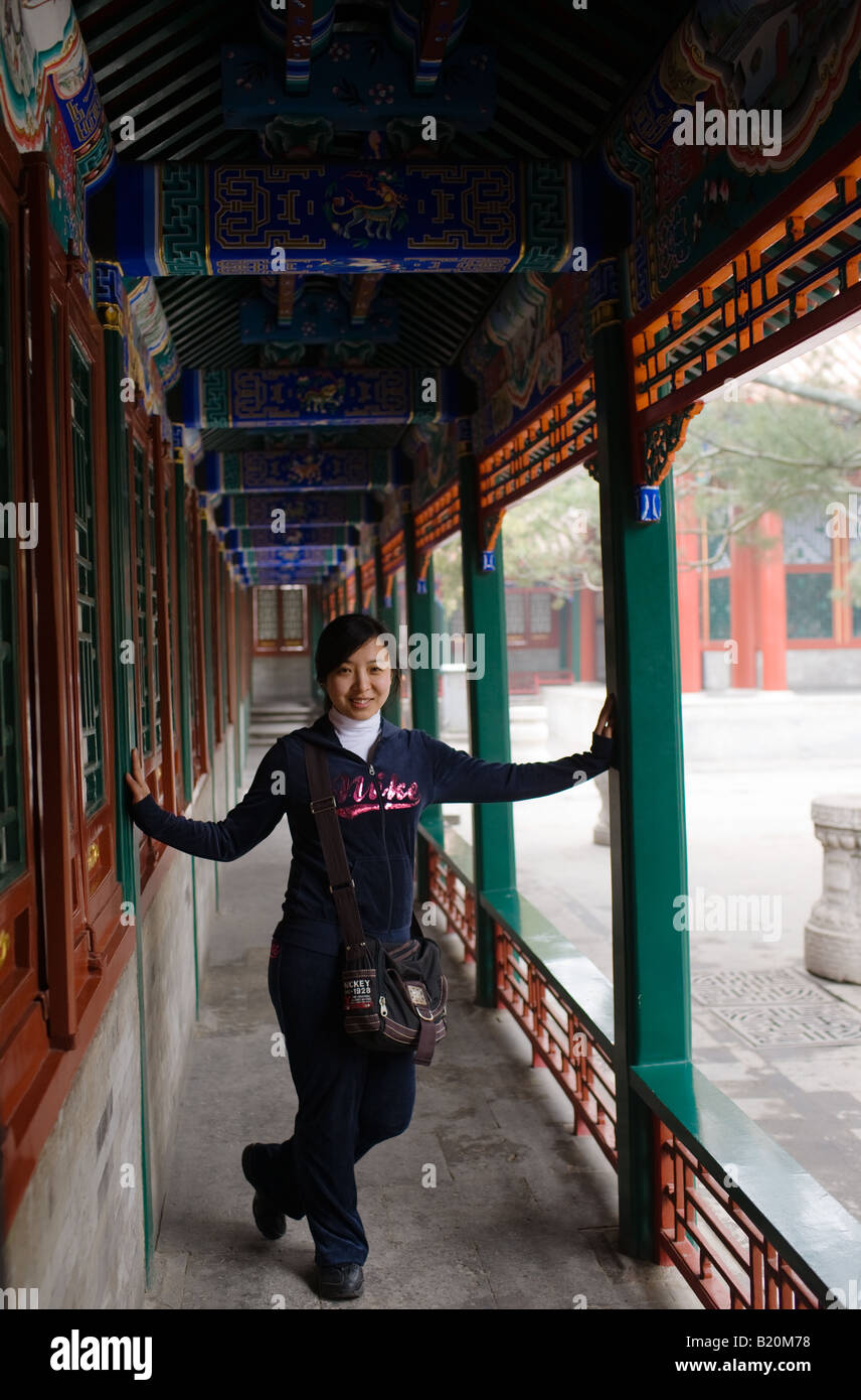 Chinese woman poses for a photograph at The Summer Palace Beijing China ...