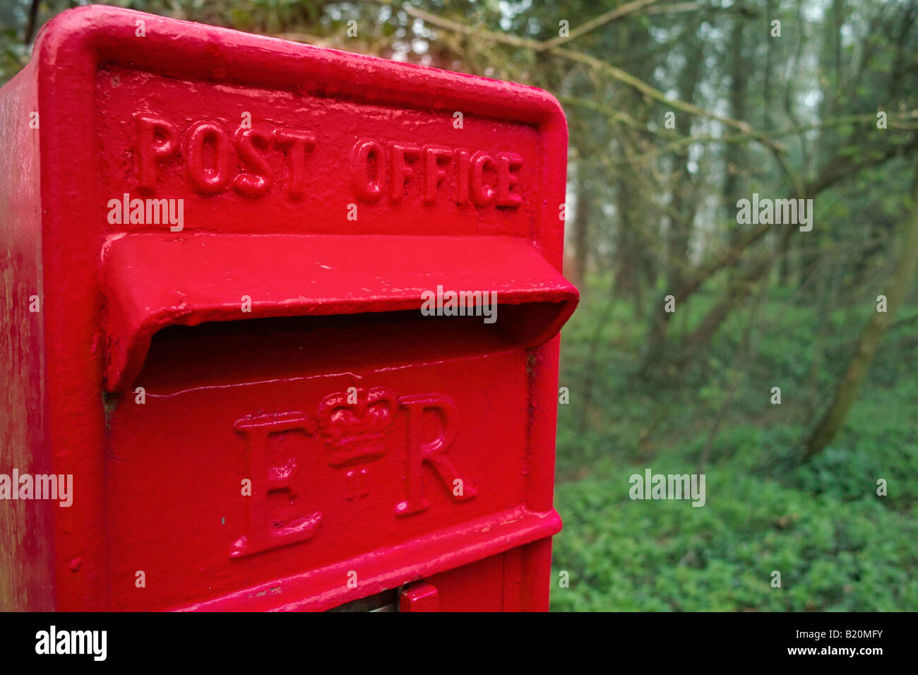 A red rural post box in the English Countryside Stock Photo - Alamy