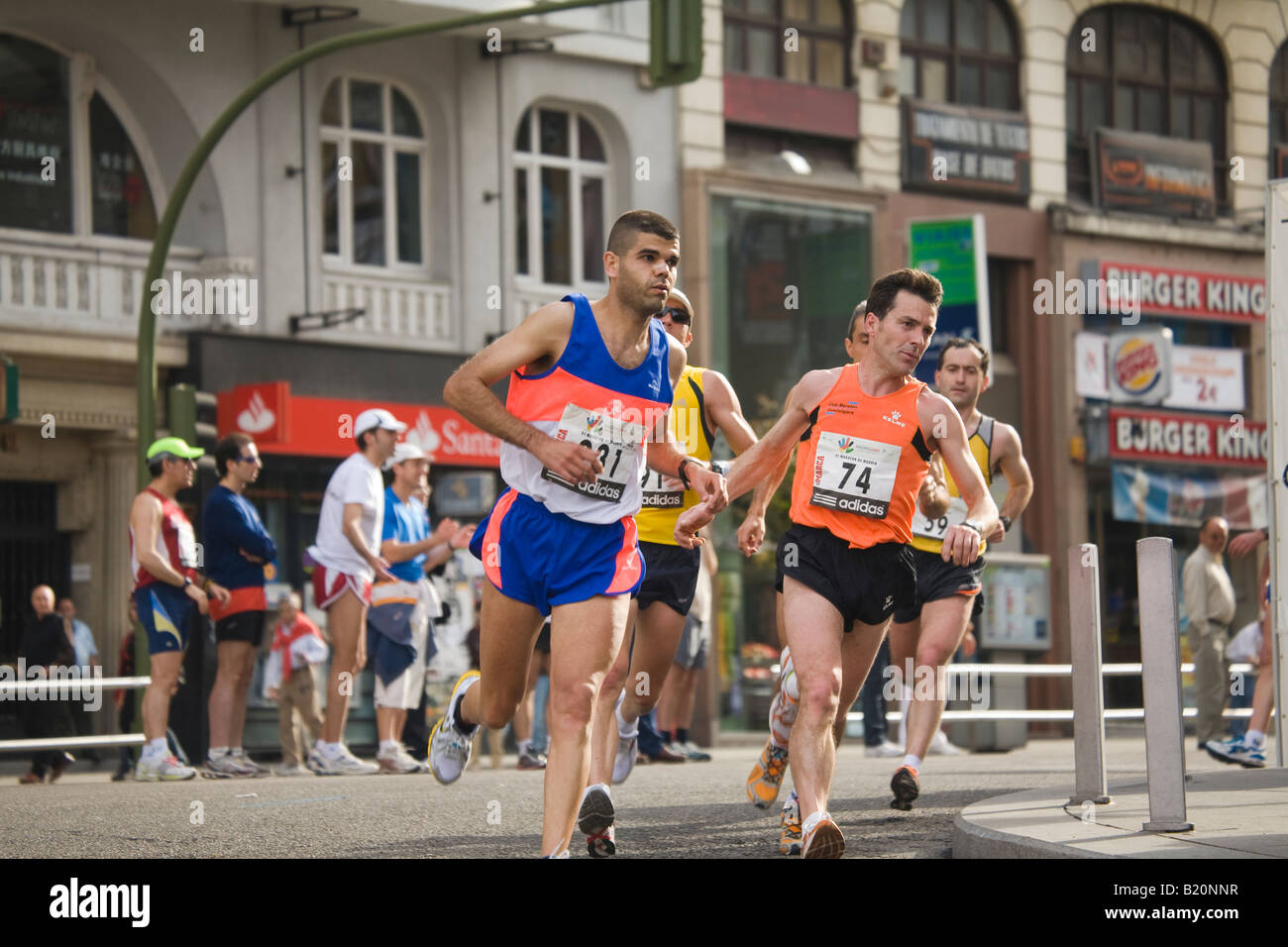 Marathon runners spectator hi-res stock photography and images - Alamy