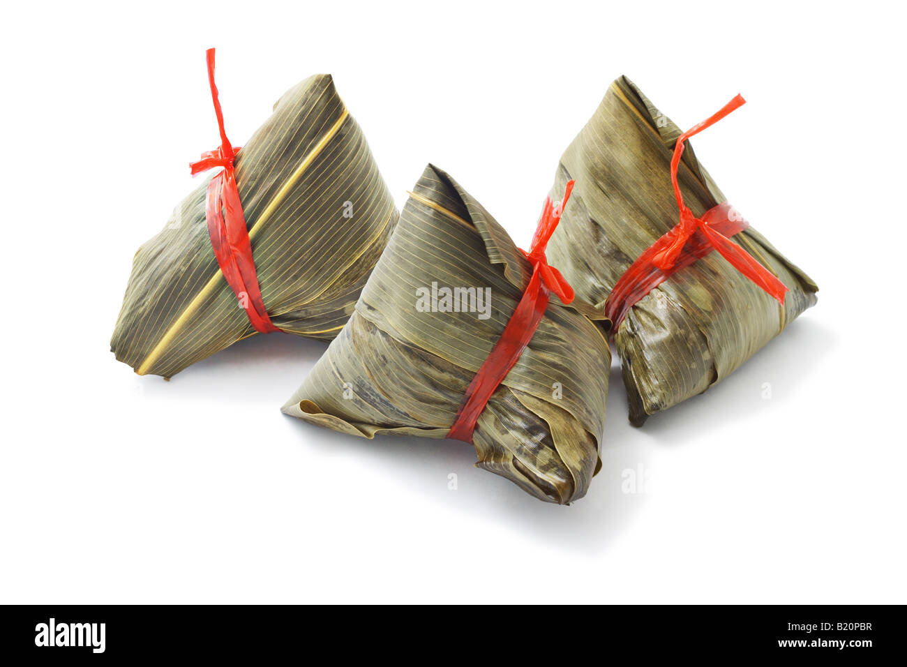 Three Chinese rice dumplings for dragon boat festival Stock Photo - Alamy