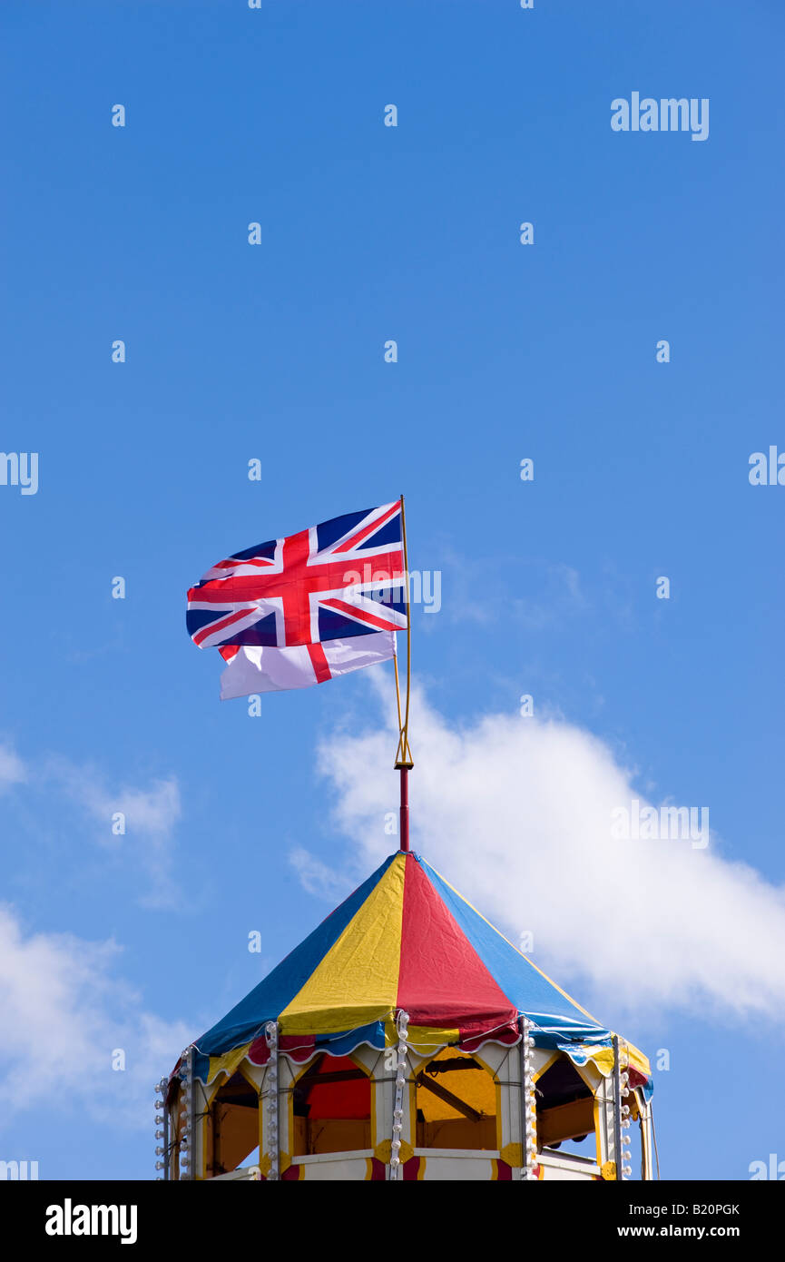 British and English flags on a funfair castle Ealing W5 London United ...