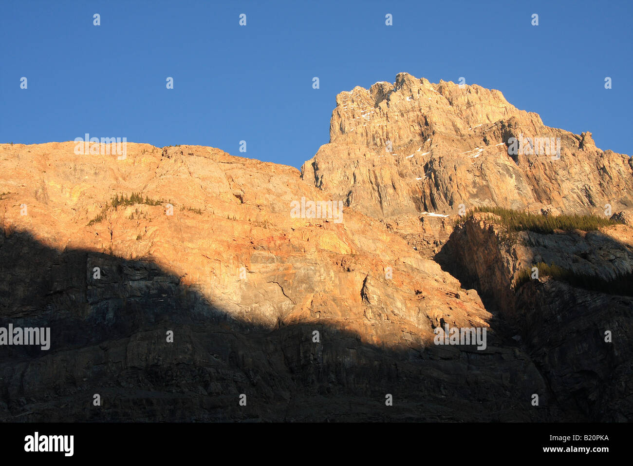 Mountain peaks at sunset in British Columbia Stock Photo - Alamy