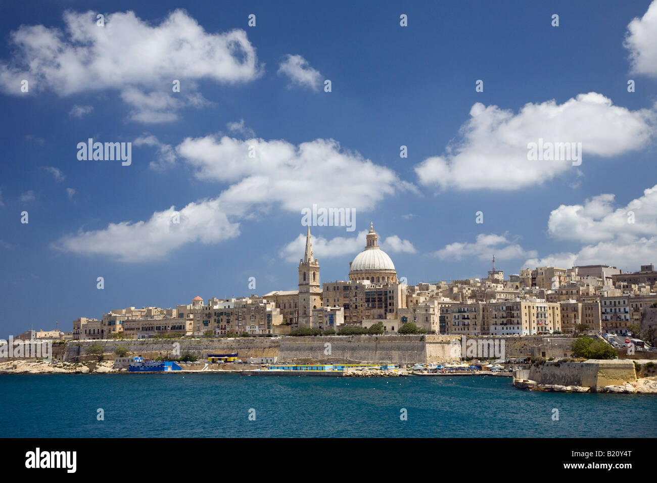 Summer view of the The Maltese City of Valetta from Misda harbour town ...