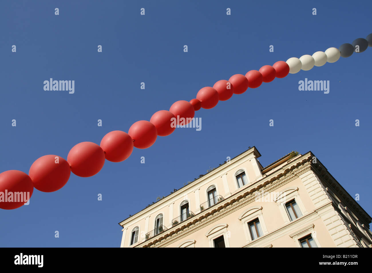 long line of balloons at event in rome italy Stock Photo - Alamy