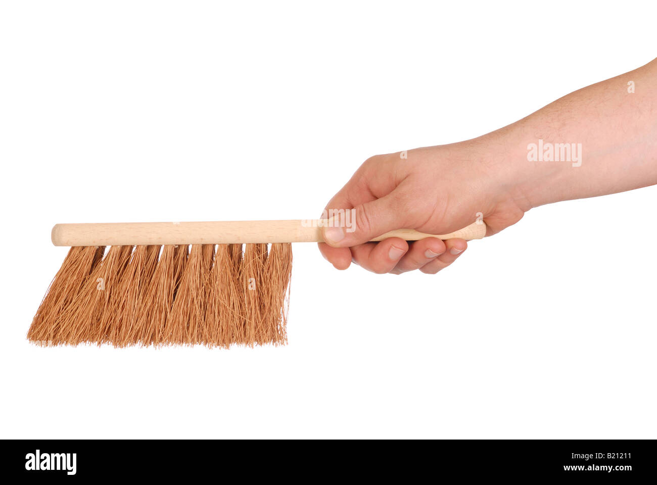 Hand with Brush Stock Photo - Alamy