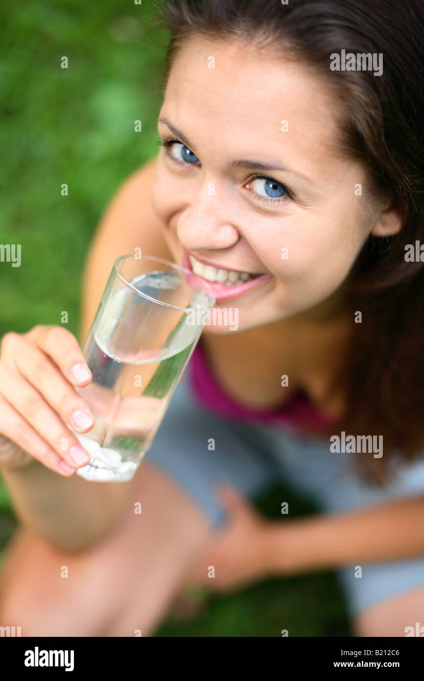 a girl drinks water Stock Photo - Alamy
