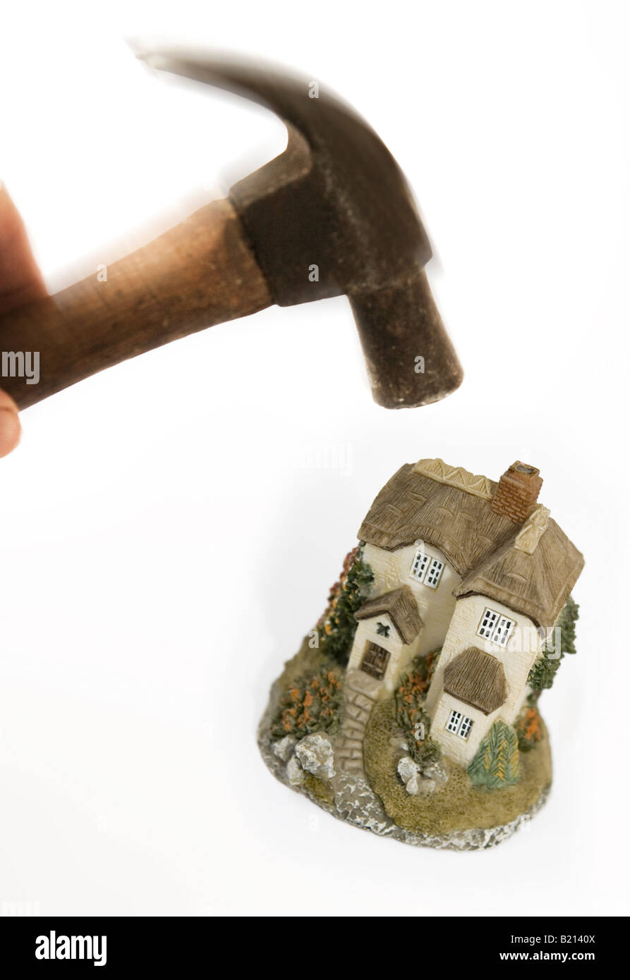 Hammer smashing into a house hi-res stock photography and images - Alamy