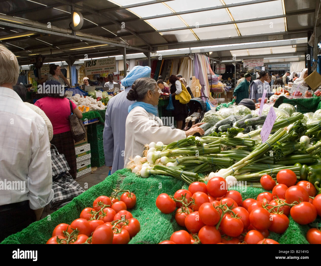 People buying from stalls in the Bull Ring Market, Birmingham City ...