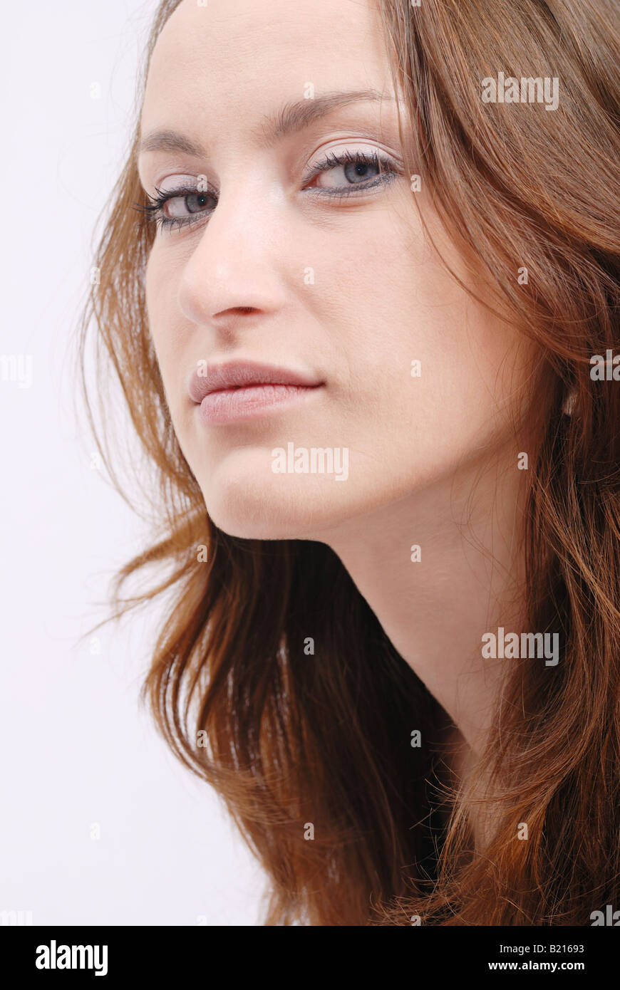 Studio portrait photo of young woman - light grey background Stock ...
