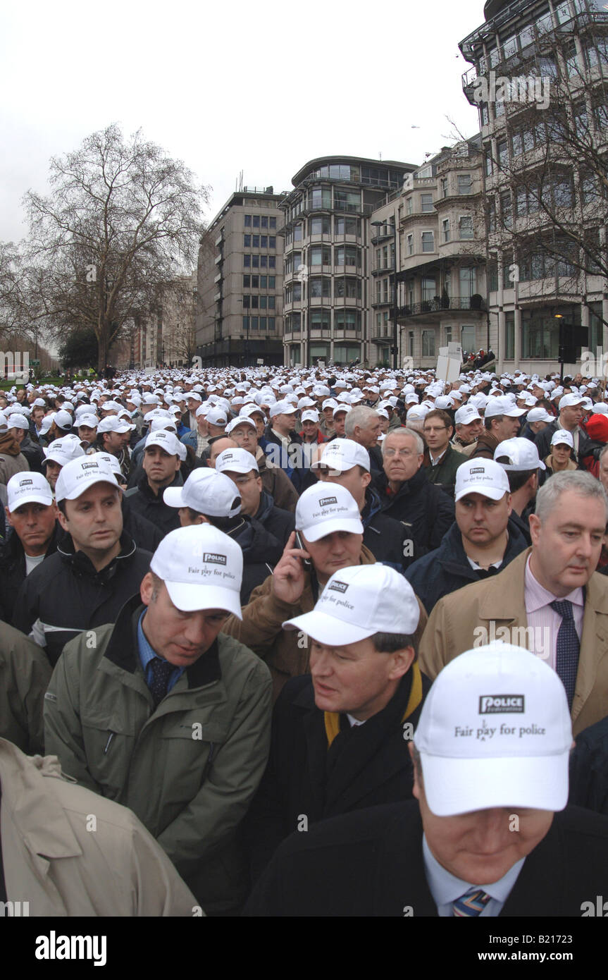 police officers marching in london in protest at their pay deal by the ...