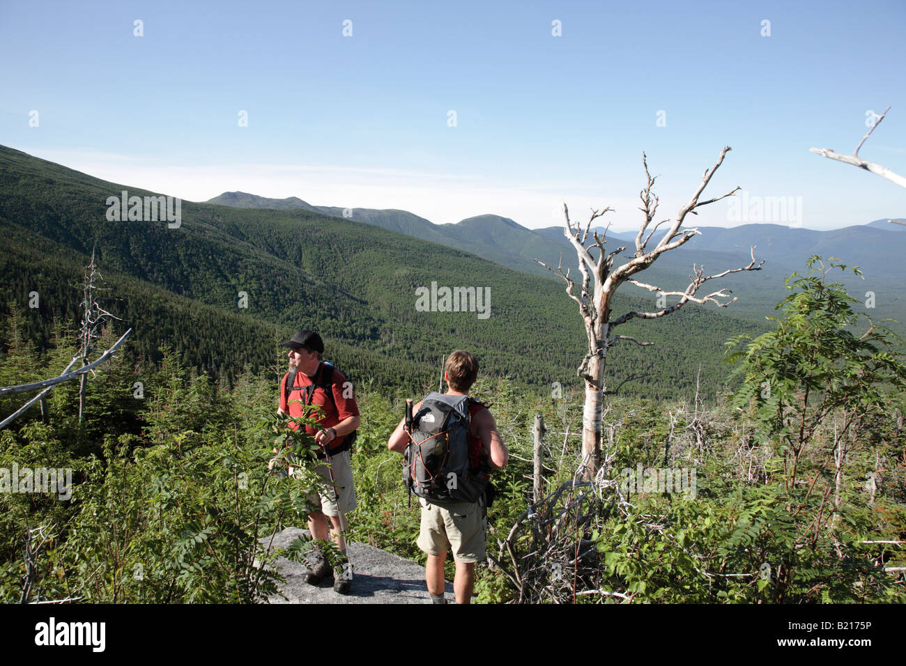Hikers climb Caps Ridge Trail during the summer months Located in the ...