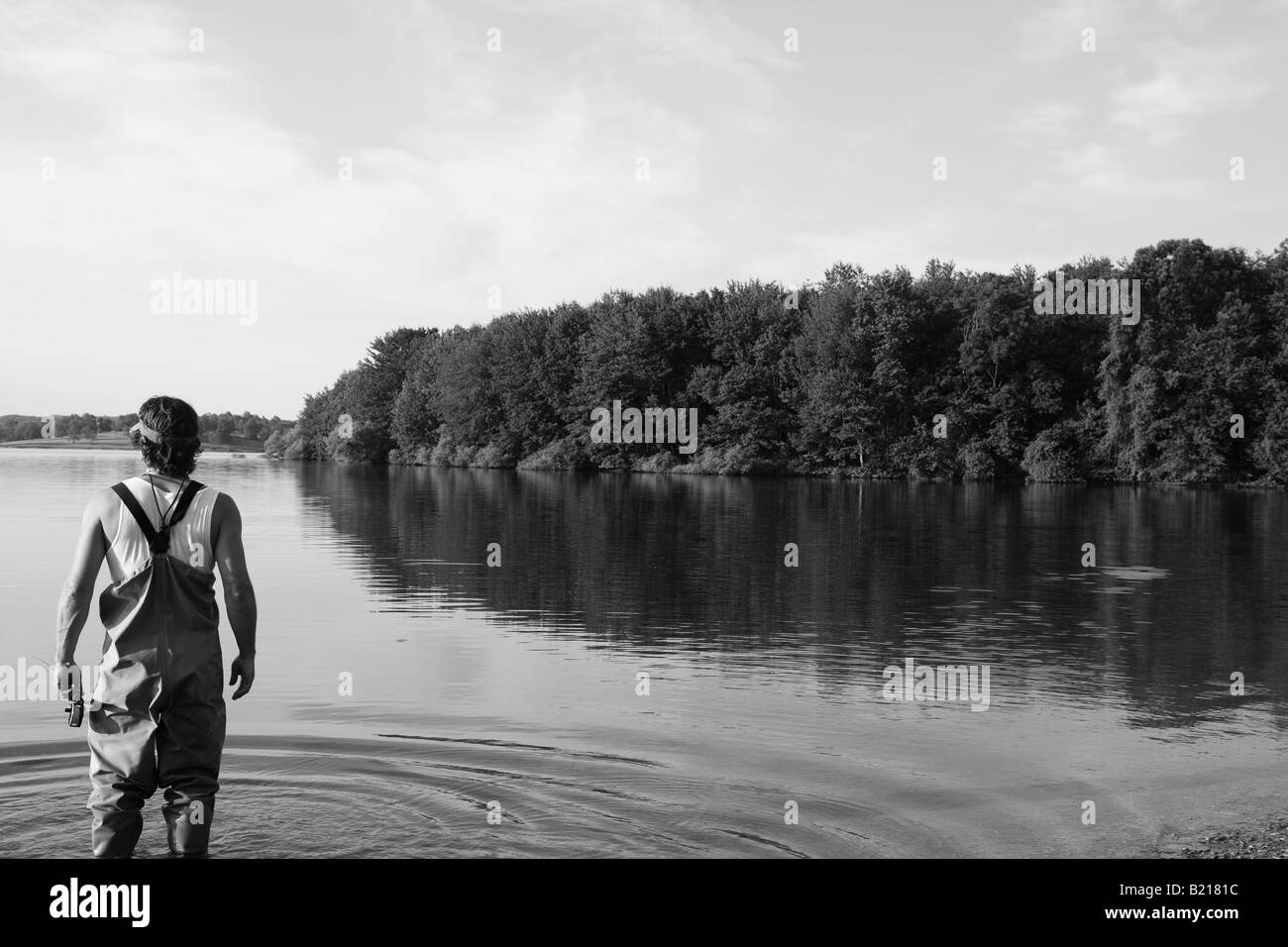 Fisherman fly fishing in Black and White Stock Photos & Images - Alamy
