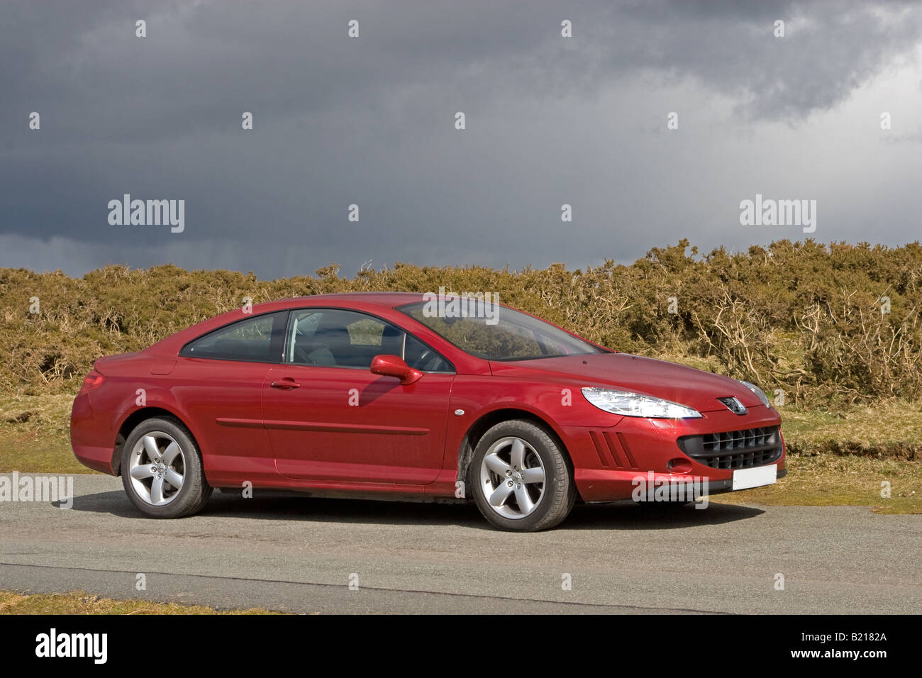Red Peugeot 407 Coupe in the Black Mountains of Wales Stock Photo - Alamy