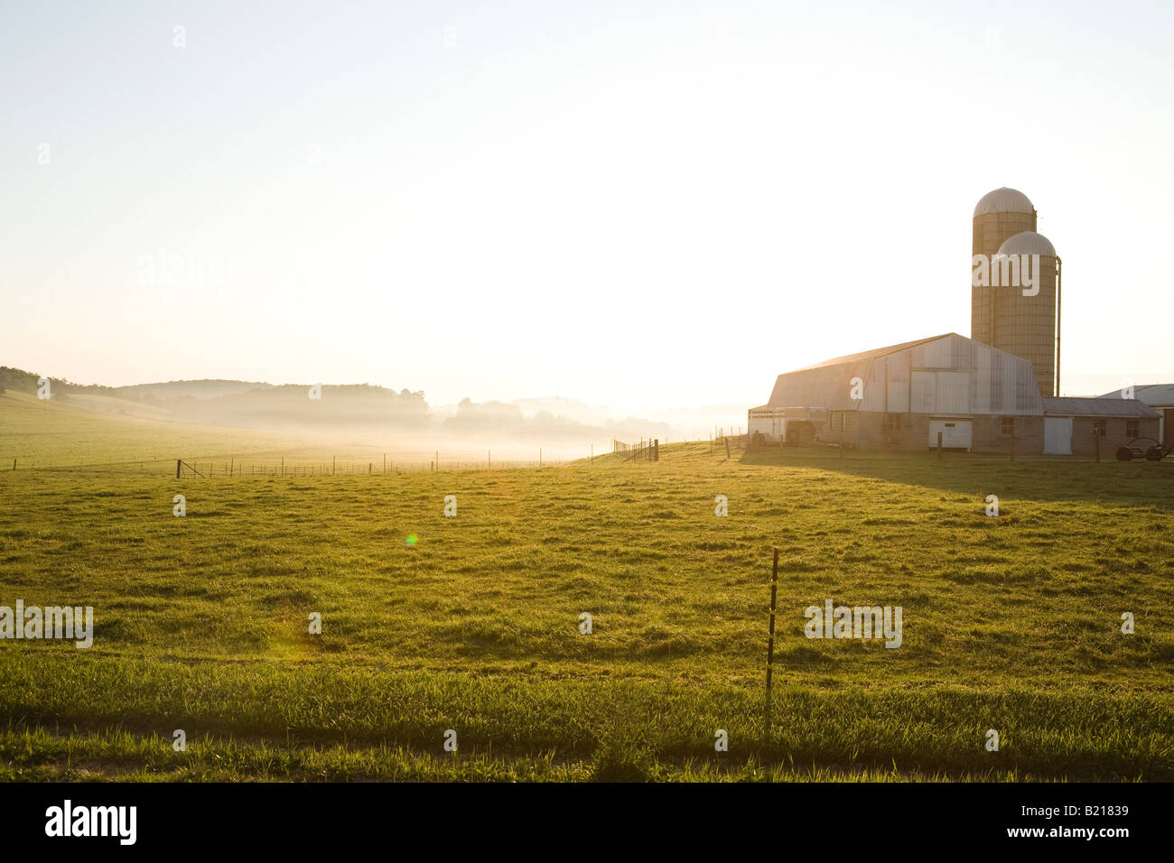 A sunrise on a the farm Stock Photo - Alamy