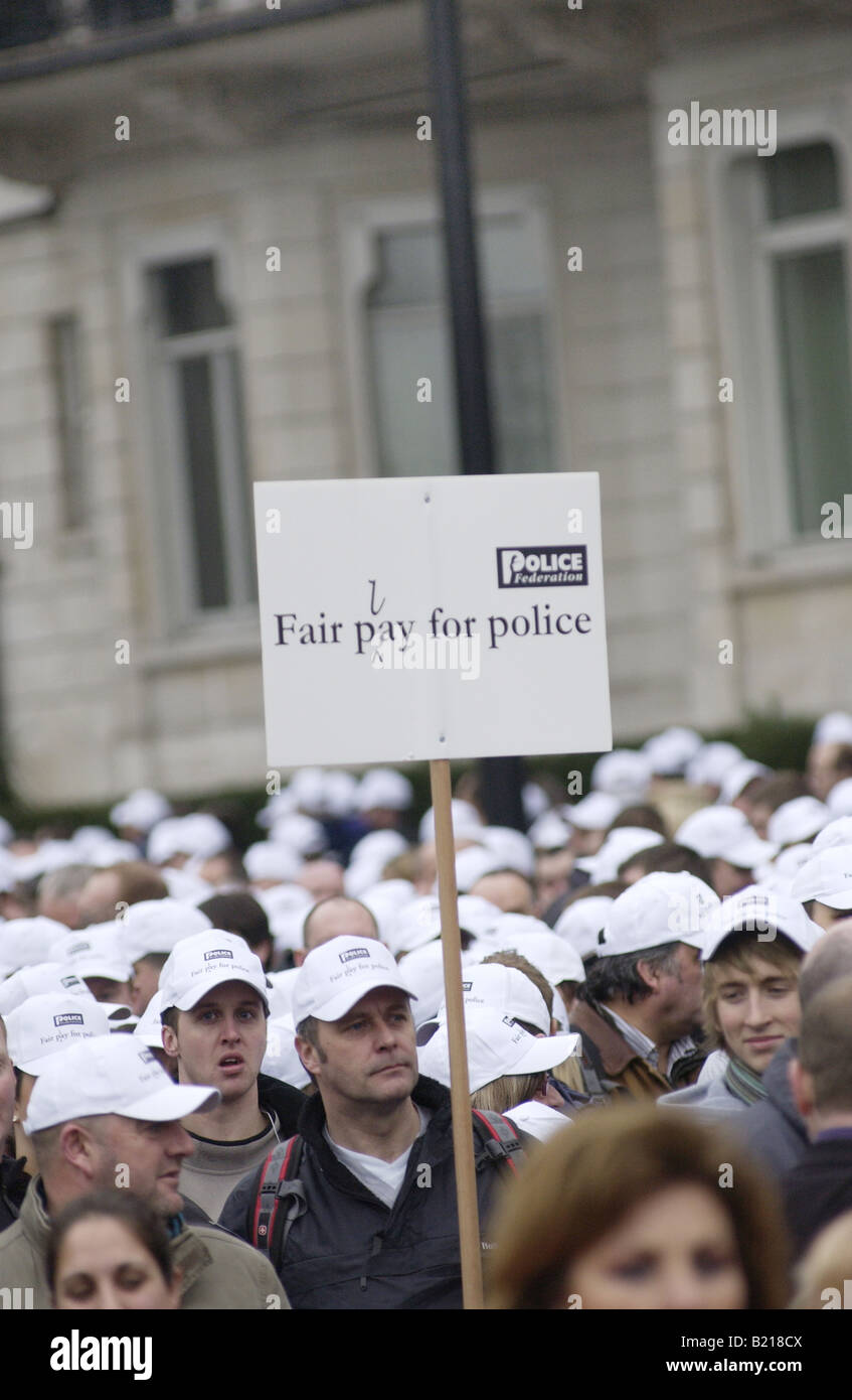 police officers marching in london in protest at their pay deal by the ...