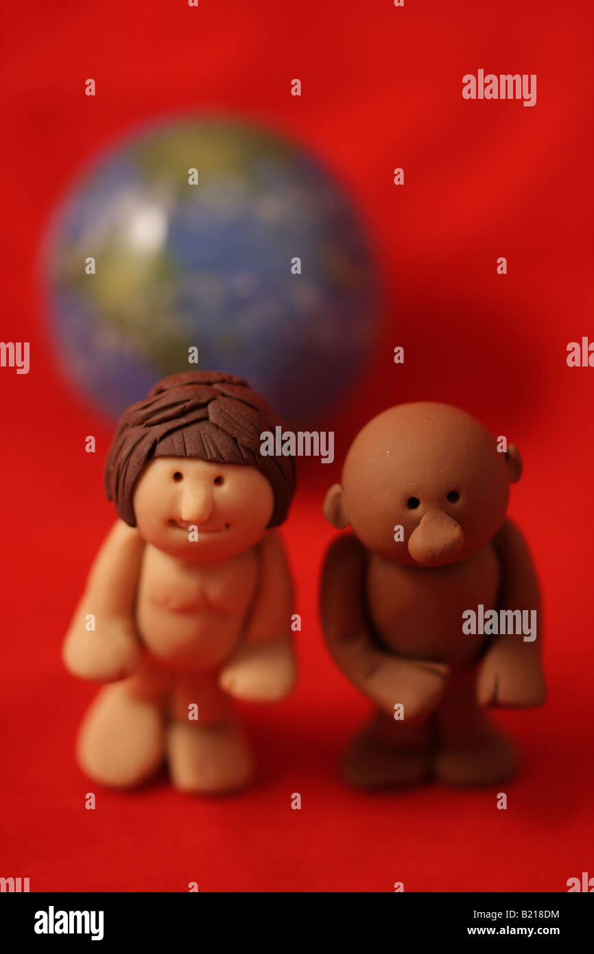 Figures backed by the Earth Stock Photo - Alamy