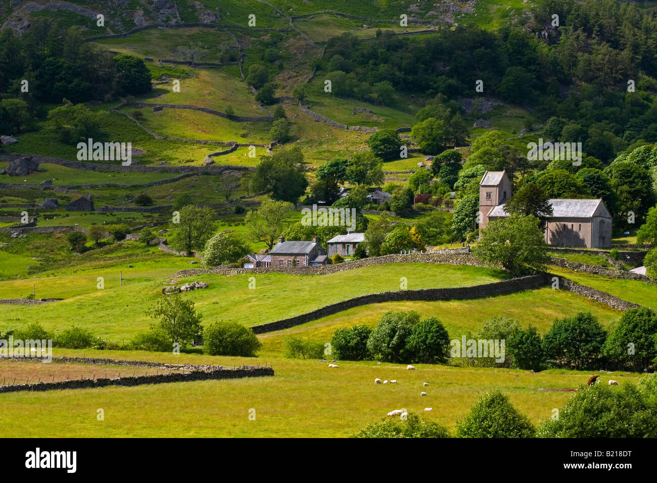 View of the village of Kentmere and the surrounding hills in the Lake ...