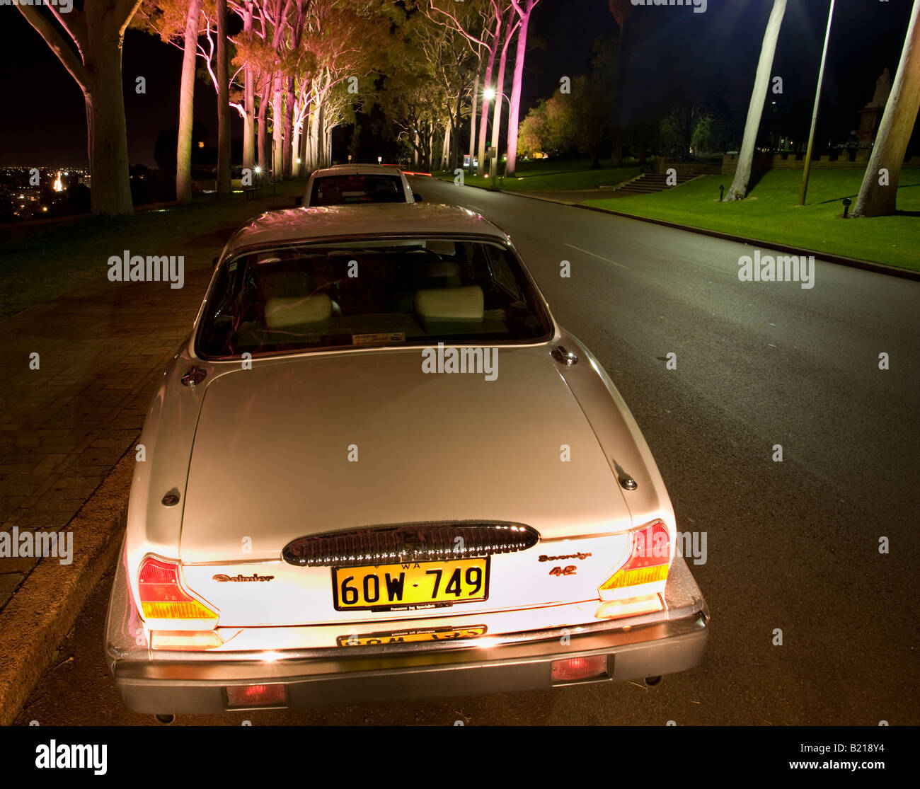 A Jaguar Daimler Sovereign car parked at King's Park at night. Perth ...